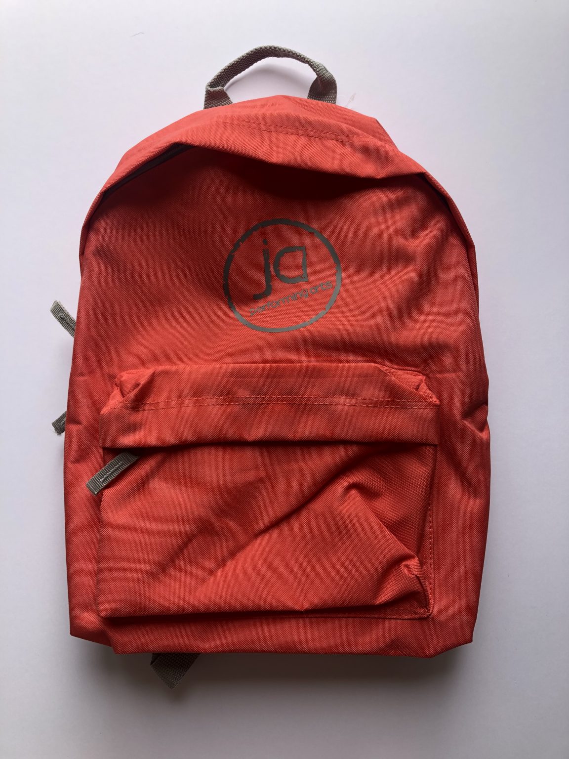 JA orange backpack - JA Perform